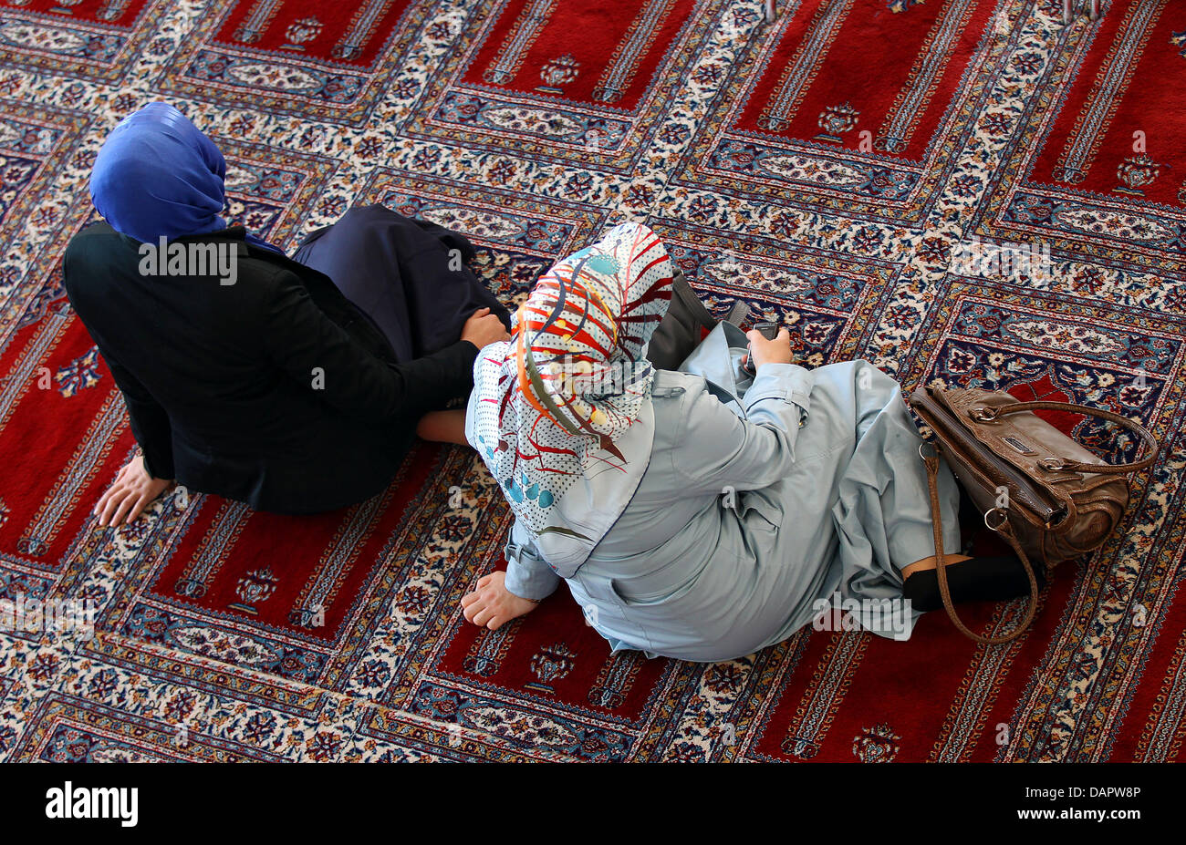 Muslim follow a sermon at the end of fasting month Ramadan in the ...