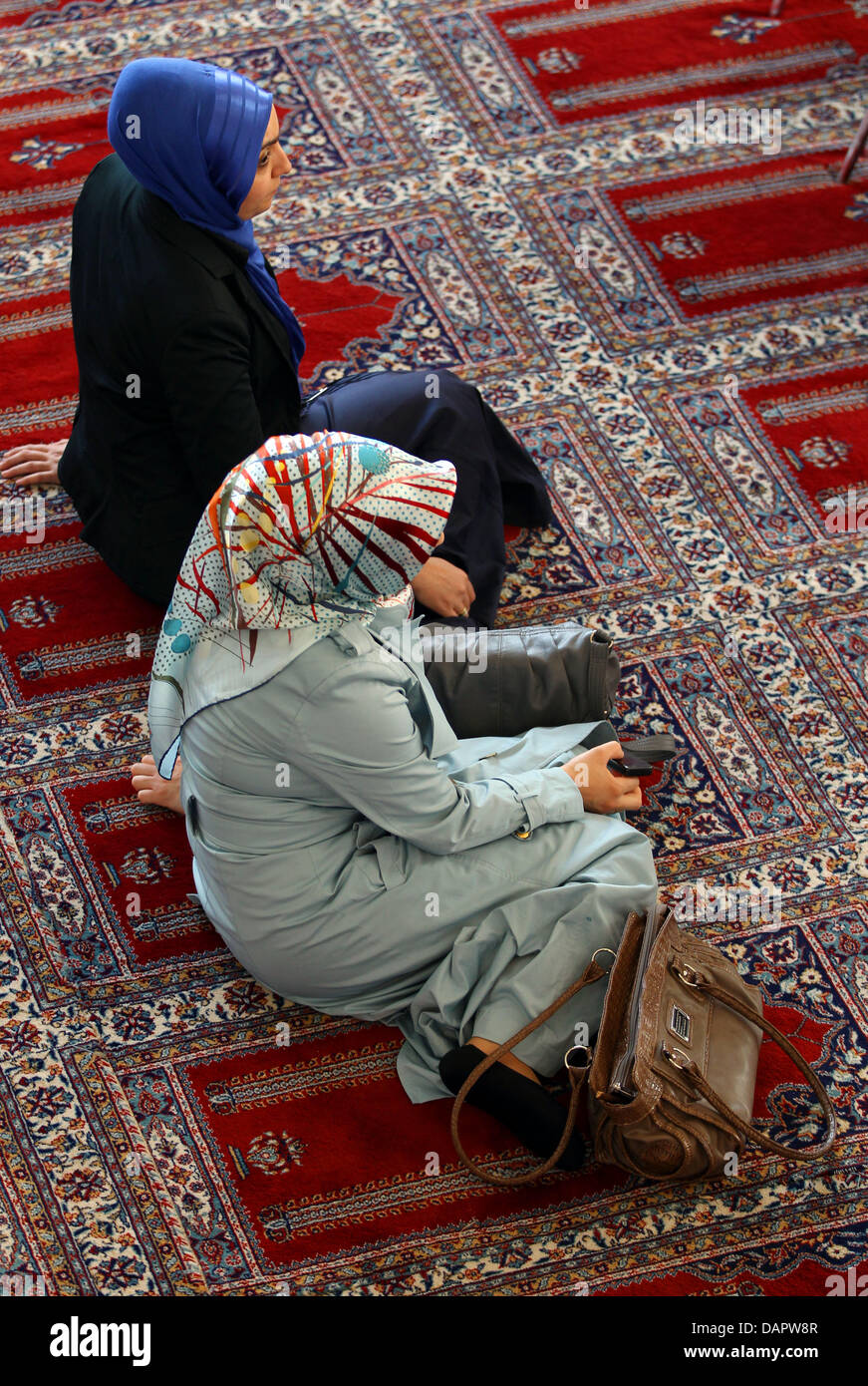 Muslim follow a sermon at the end of fasting month Ramadan in the ...