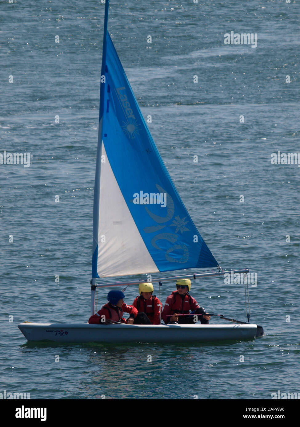 Three children sailing a Laser Pico yacht, Plymouth, UK 2013 Stock ...