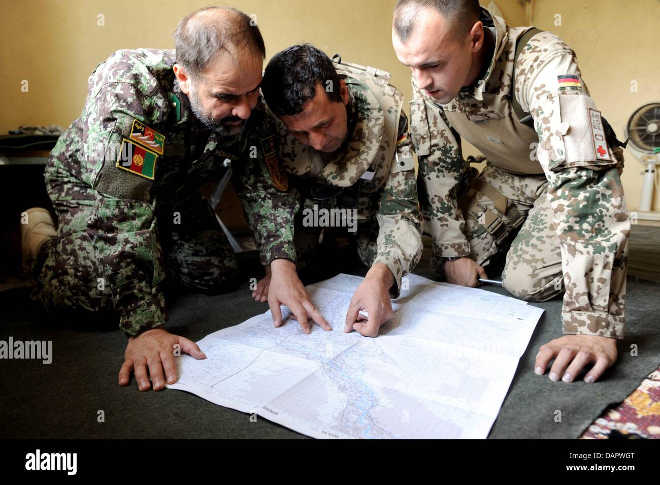 German Armed Forces soldiers and the captain of the Afghan National ...