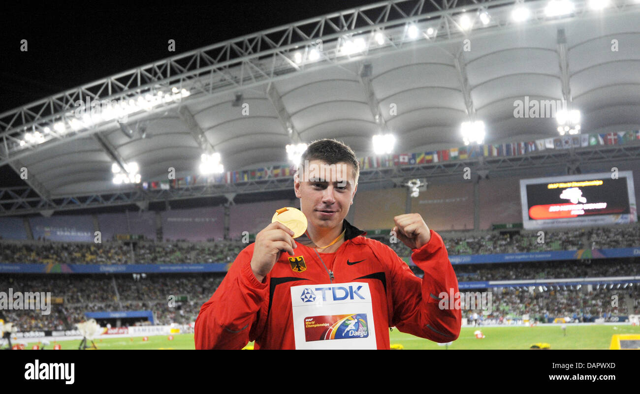 David Storl of Germany wins the gold medal in the Shot Put final at the ...