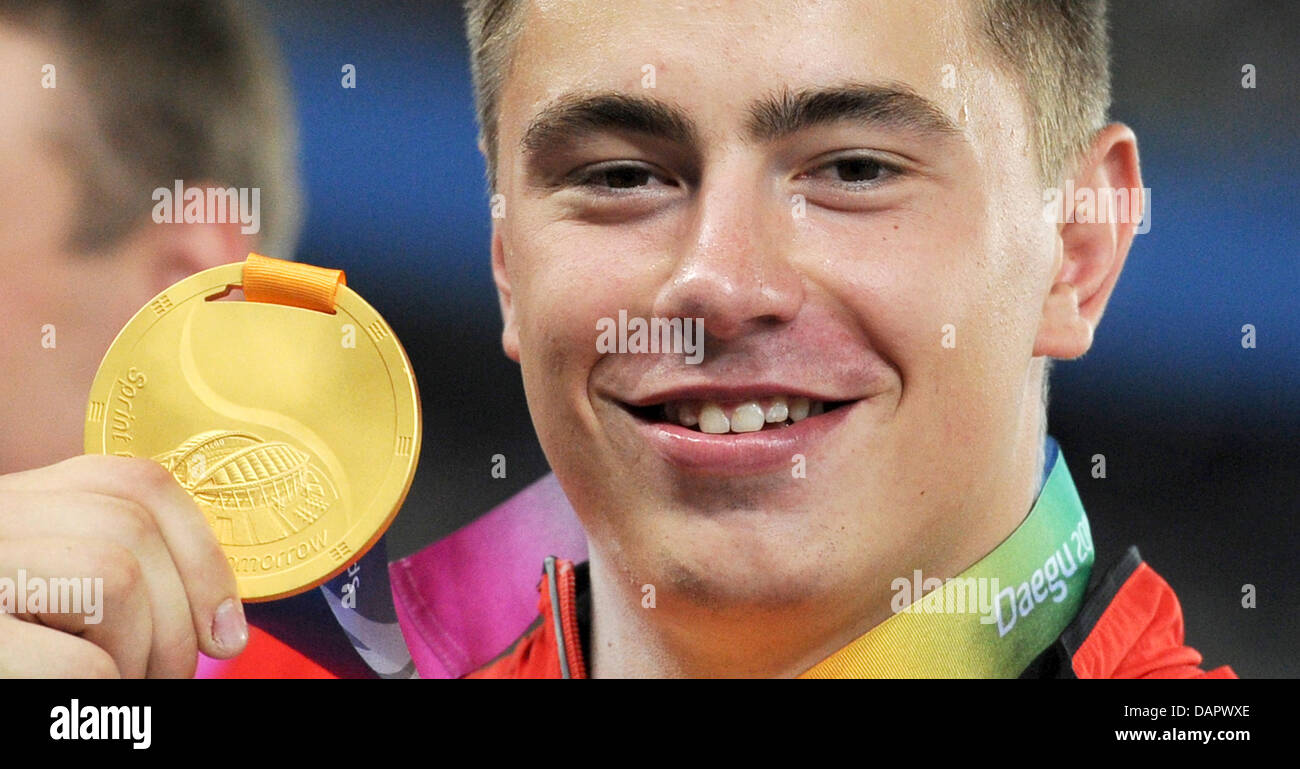 David Storl of Germany wins the gold medal in the Shot Put final at the ...