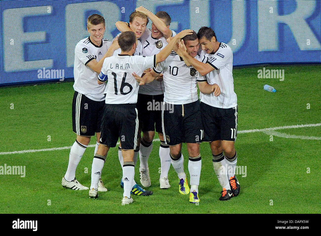 Germany's Lukas Podolski (2nd r) celebrates with team mates after ...