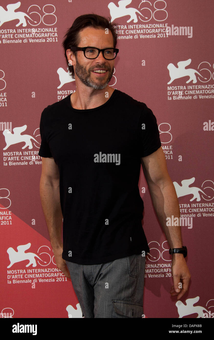 Australian actor Guy Pearce poses after the press conference of ...