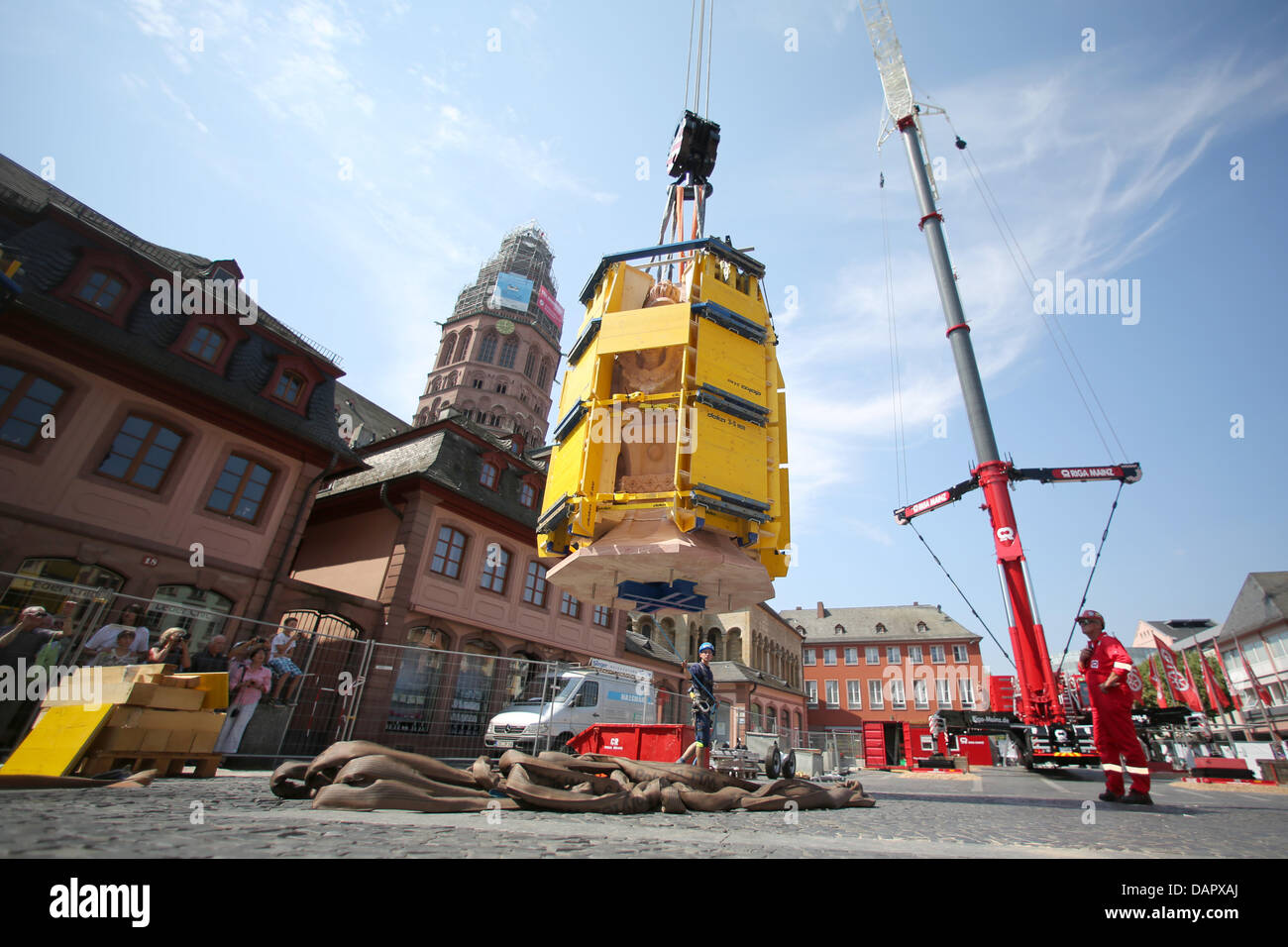 A part of the top of the cathedral's tower is exchanged with a special ...