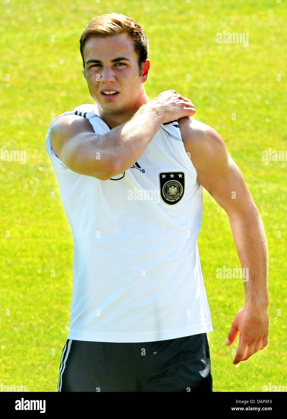 German national soccer team player Mario Goetze works out during a ...