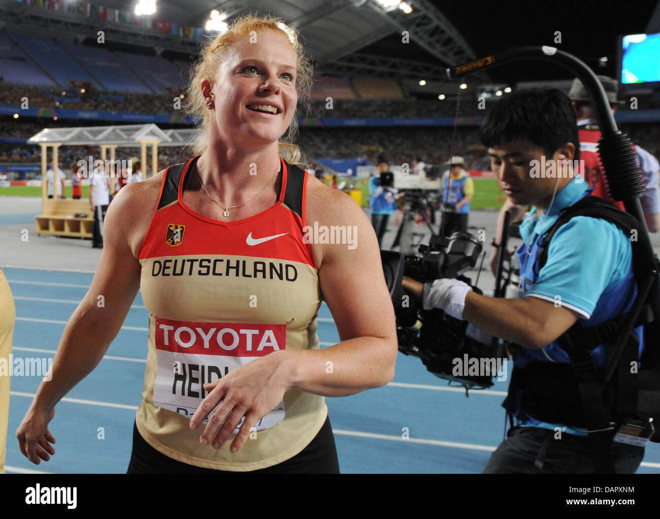 Betty Heidler of Germany celebrates winning silver in the women's ...