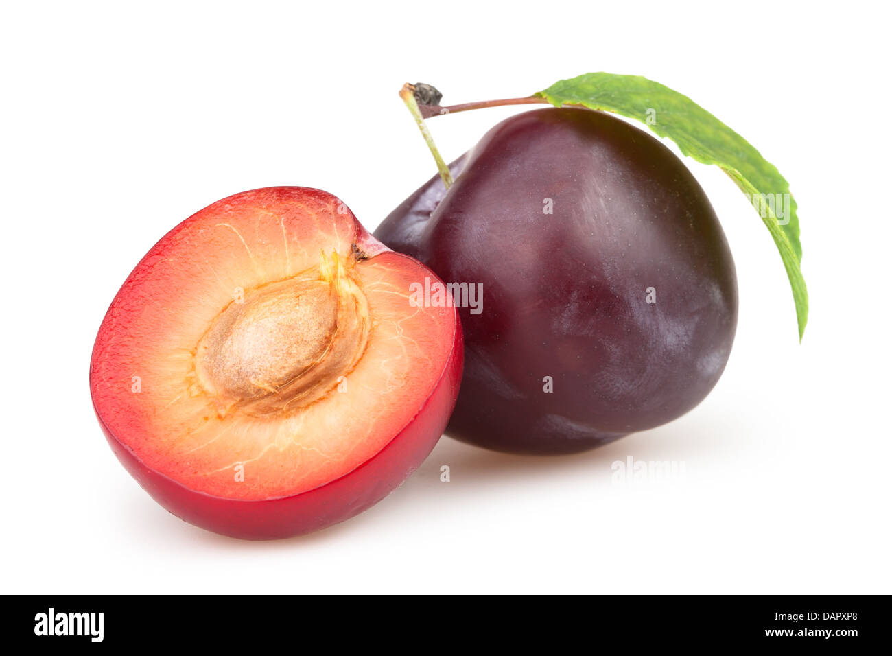 Plum half fruit on Cut Out Stock Images & Pictures - Alamy