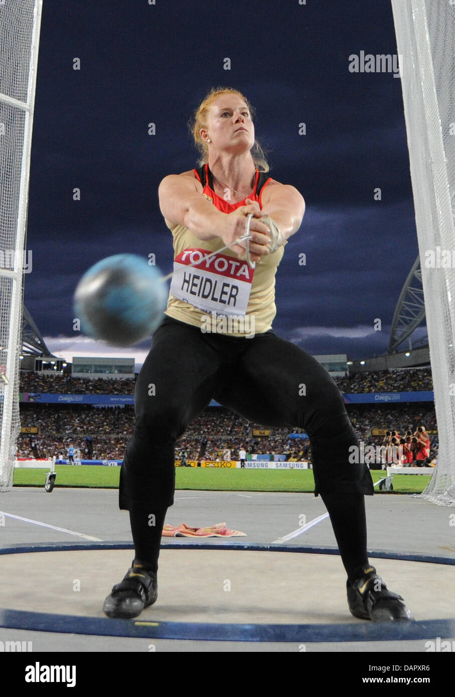 Betty Heidler of Germany competes in the women's Hammer Throw Final at ...