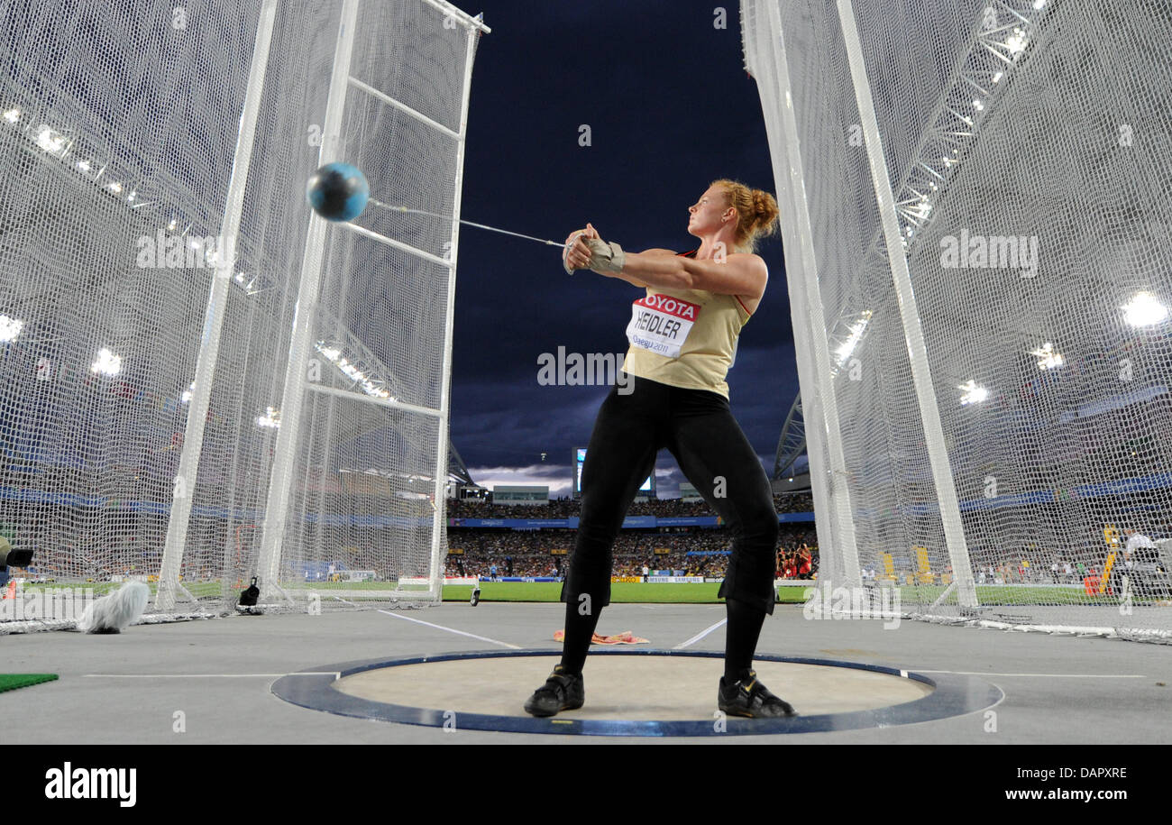 Betty Heidler of Germany competes in the women's Hammer Throw Final at ...