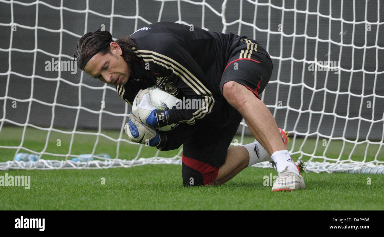 Germany's goalkeeper Tim Wiese catches the ball during training session ...