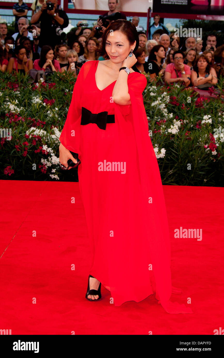 Chinese singer Kit Chan arrives at the premiere of 'Tinker, Taylor ...