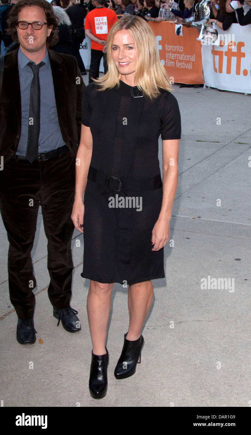 US director David Guggenheim and his wife, US actress Elisabeth Shue ...