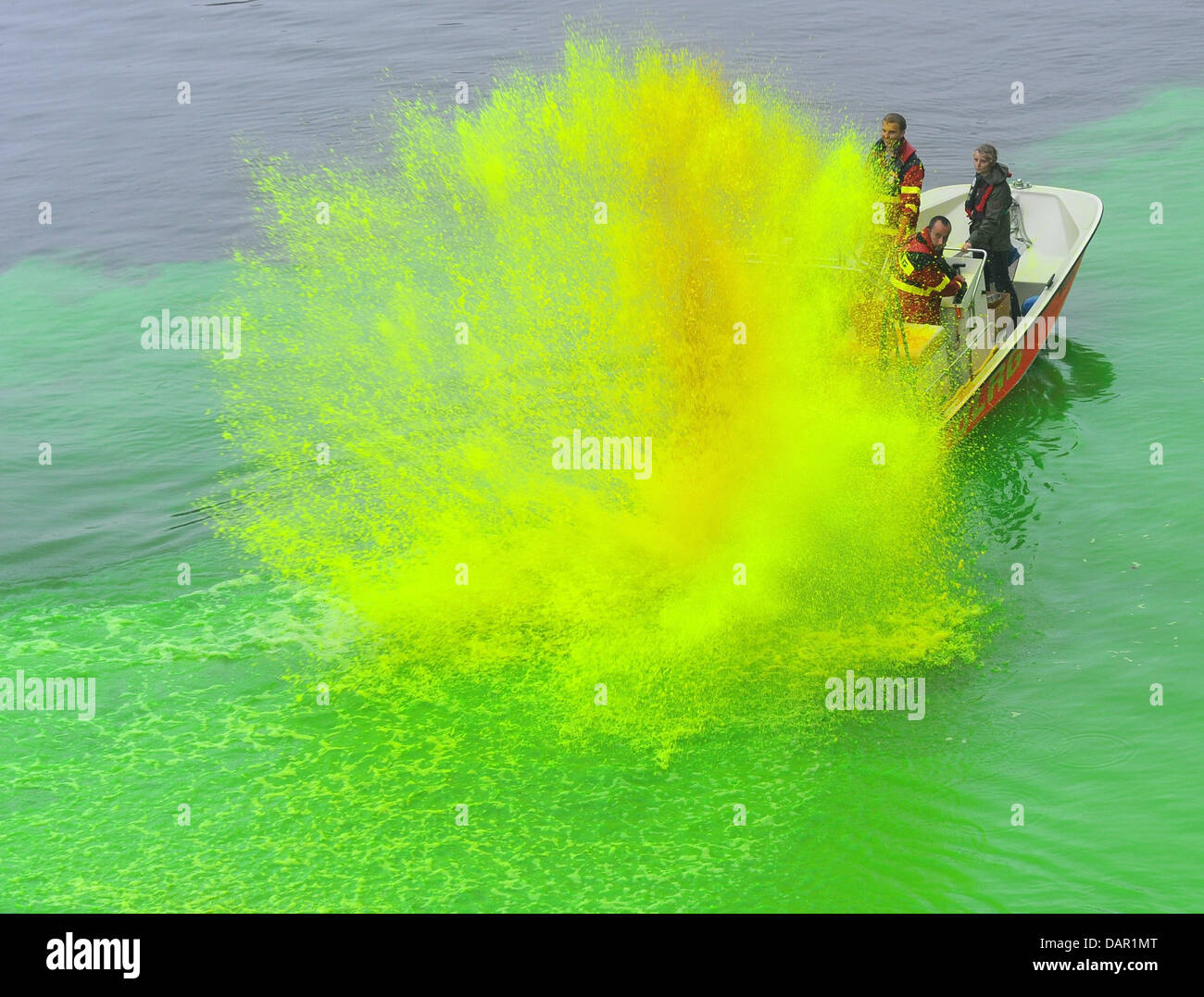 Argentinian artist Uriburu (dressed in green) and helpers of the German ...