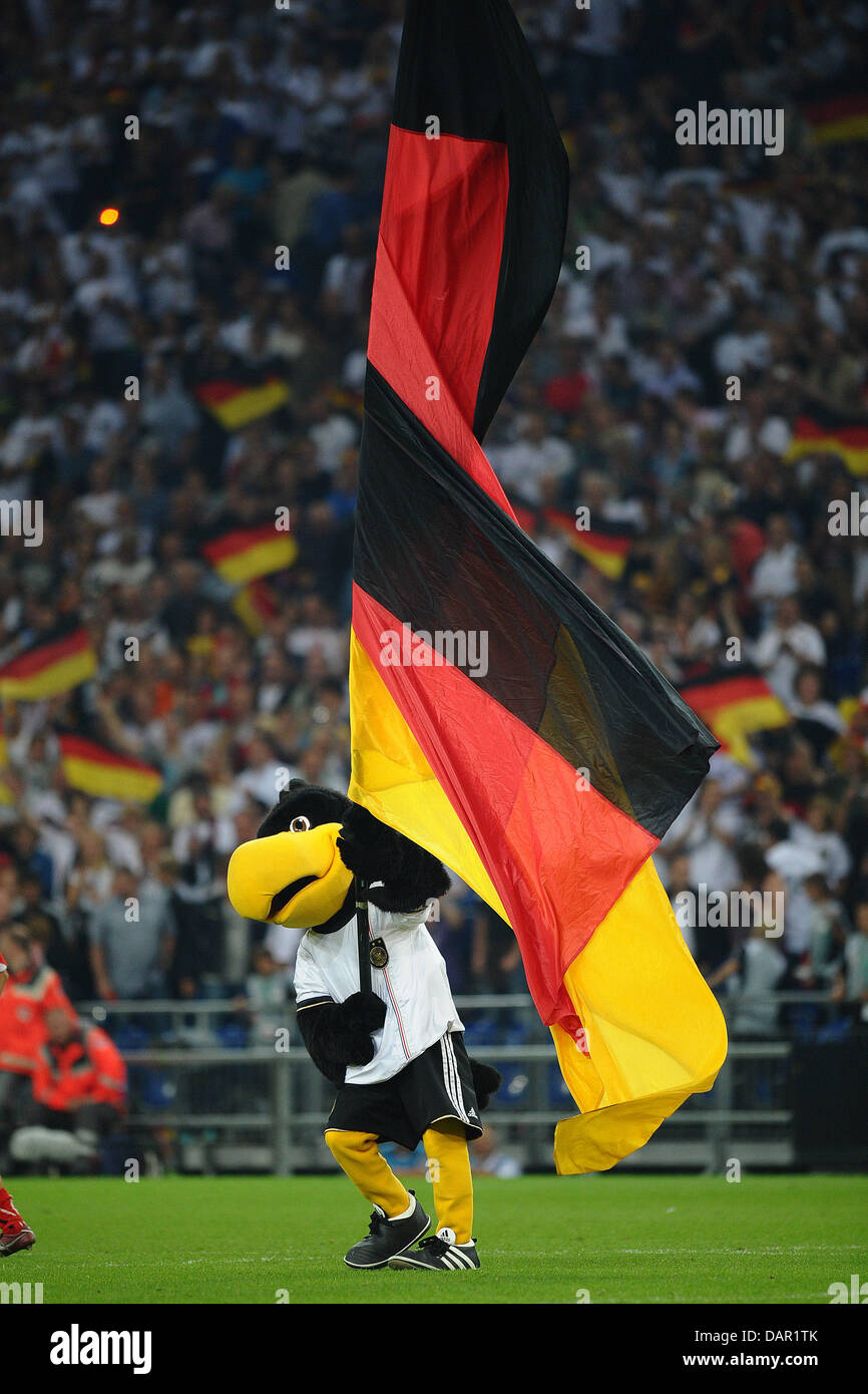 The German mascot Paule carries the German flag prior to the European ...