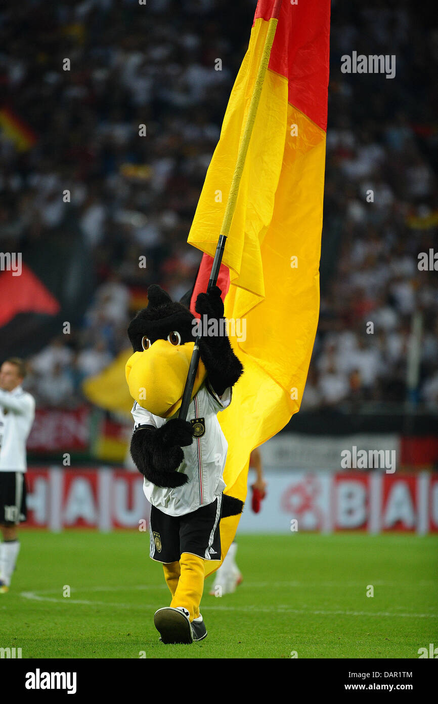 The German mascot Paule carries the German flag prior to the European ...