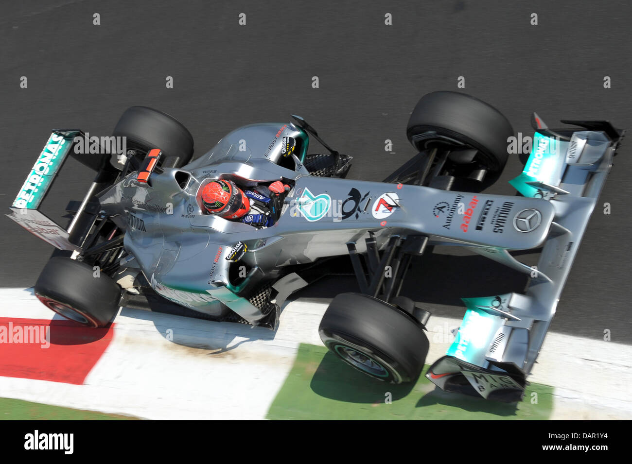 German Formula One driver Michael Schumacher of Mercedes GP steers his ...