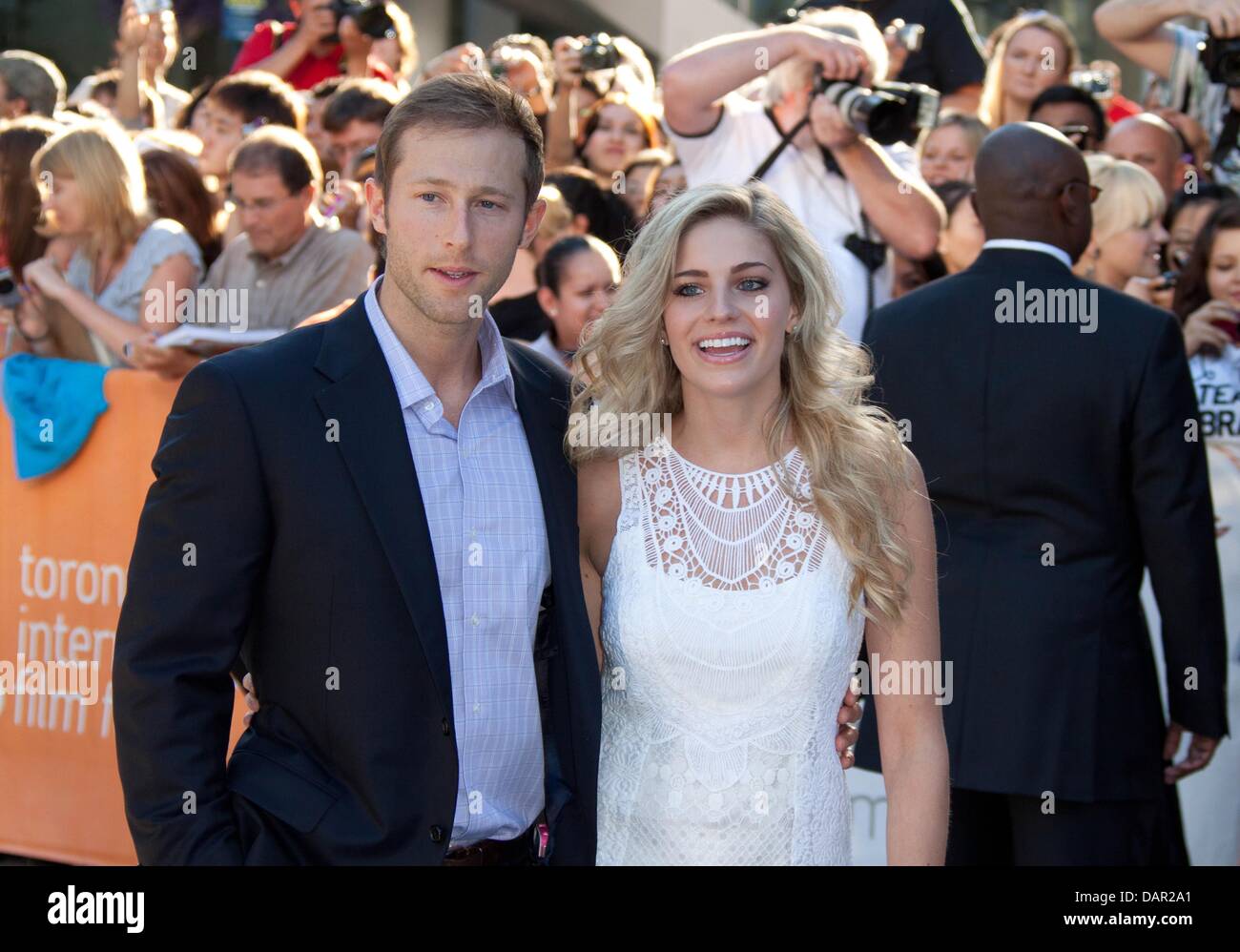US actor Casey Bond and guest arrives at the premiere of "Moneyball" at ...