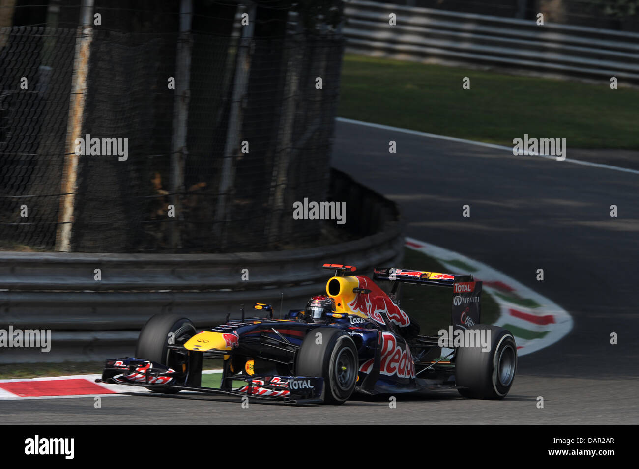 German Formula One driver Sebastian Vettel of Red Bull steers his car ...