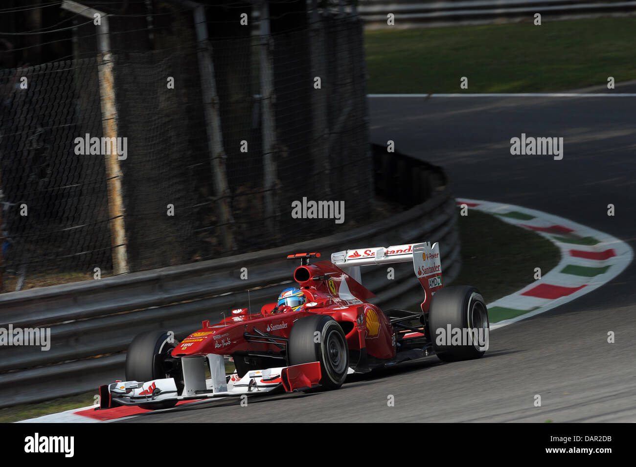 Spanish Formula One driver Fernando Alonso of Ferrari steers his car ...