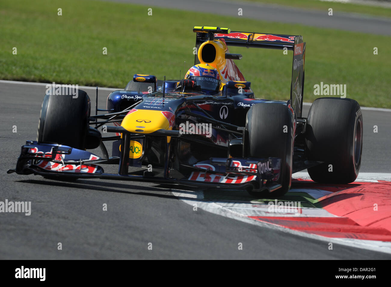 Australian Formula One driver Mark Webber of Red Bull steers his car ...