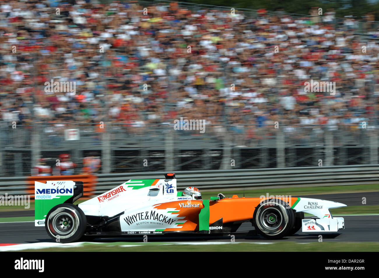 German Formula One driver Adrian Sutil of Force India steers his car ...
