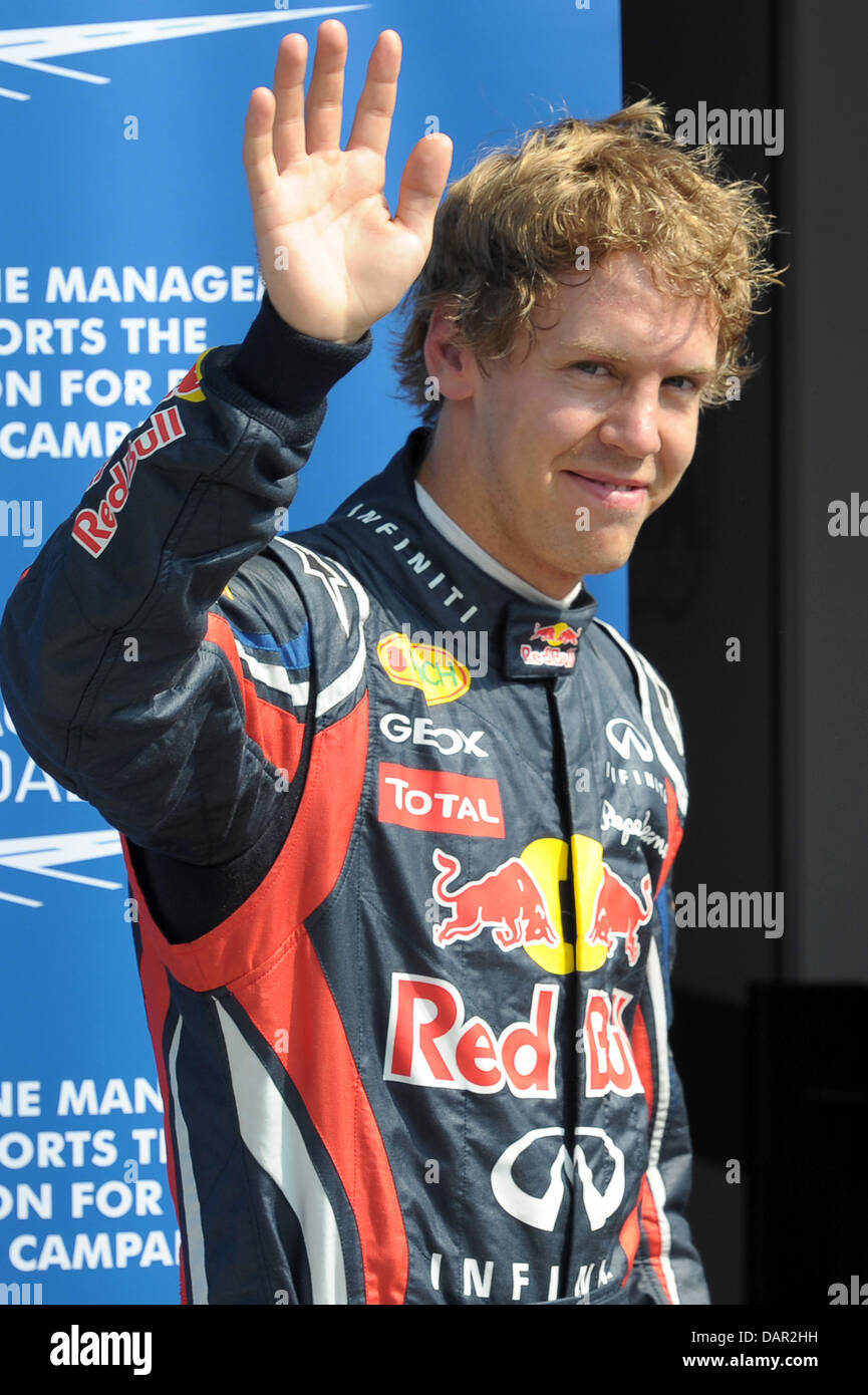 German Formula One driver Sebastian Vettel of Red Bull celebrates at ...