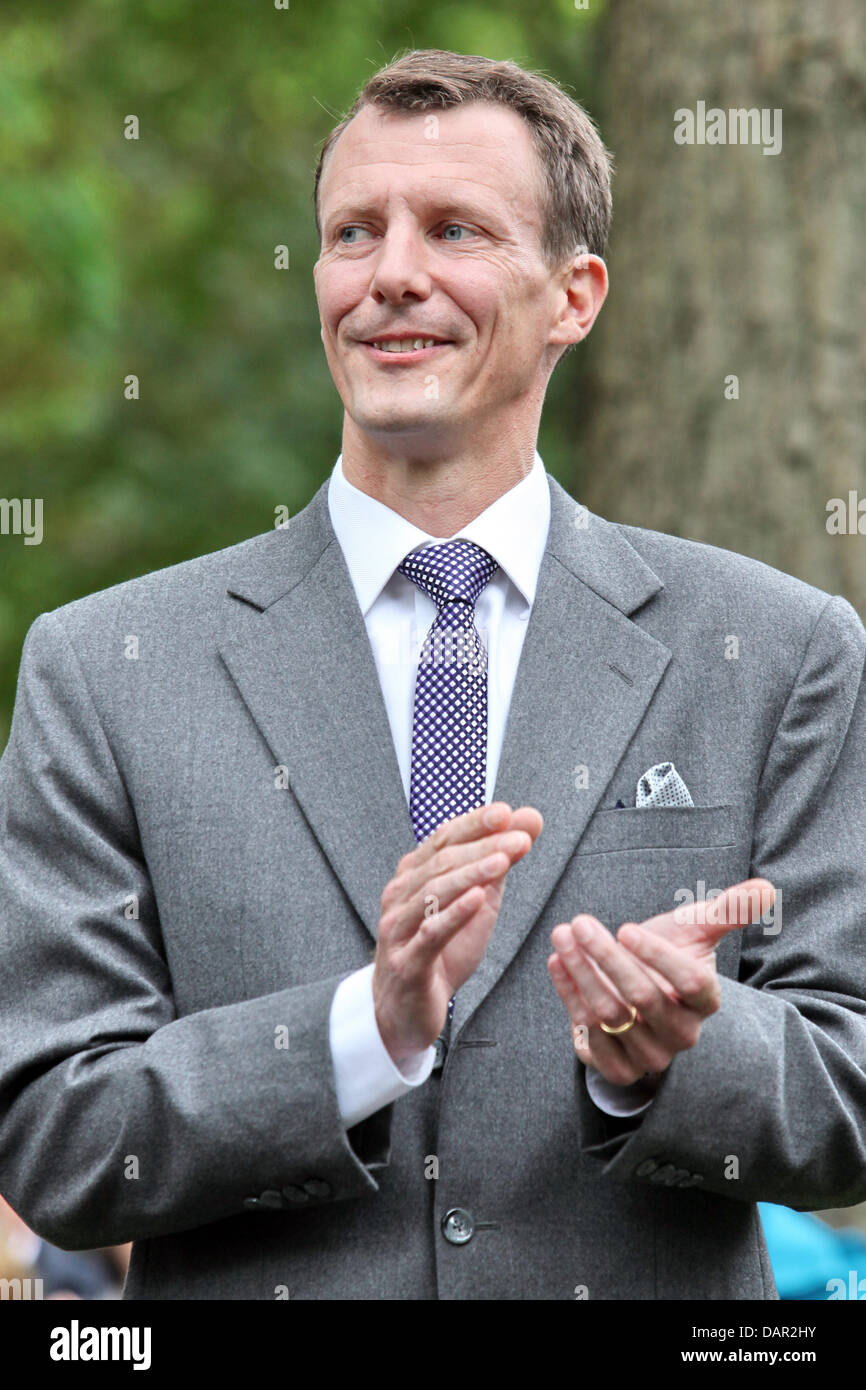 Prince Joachim of Denmark applauds during the dedication ceremony of ...