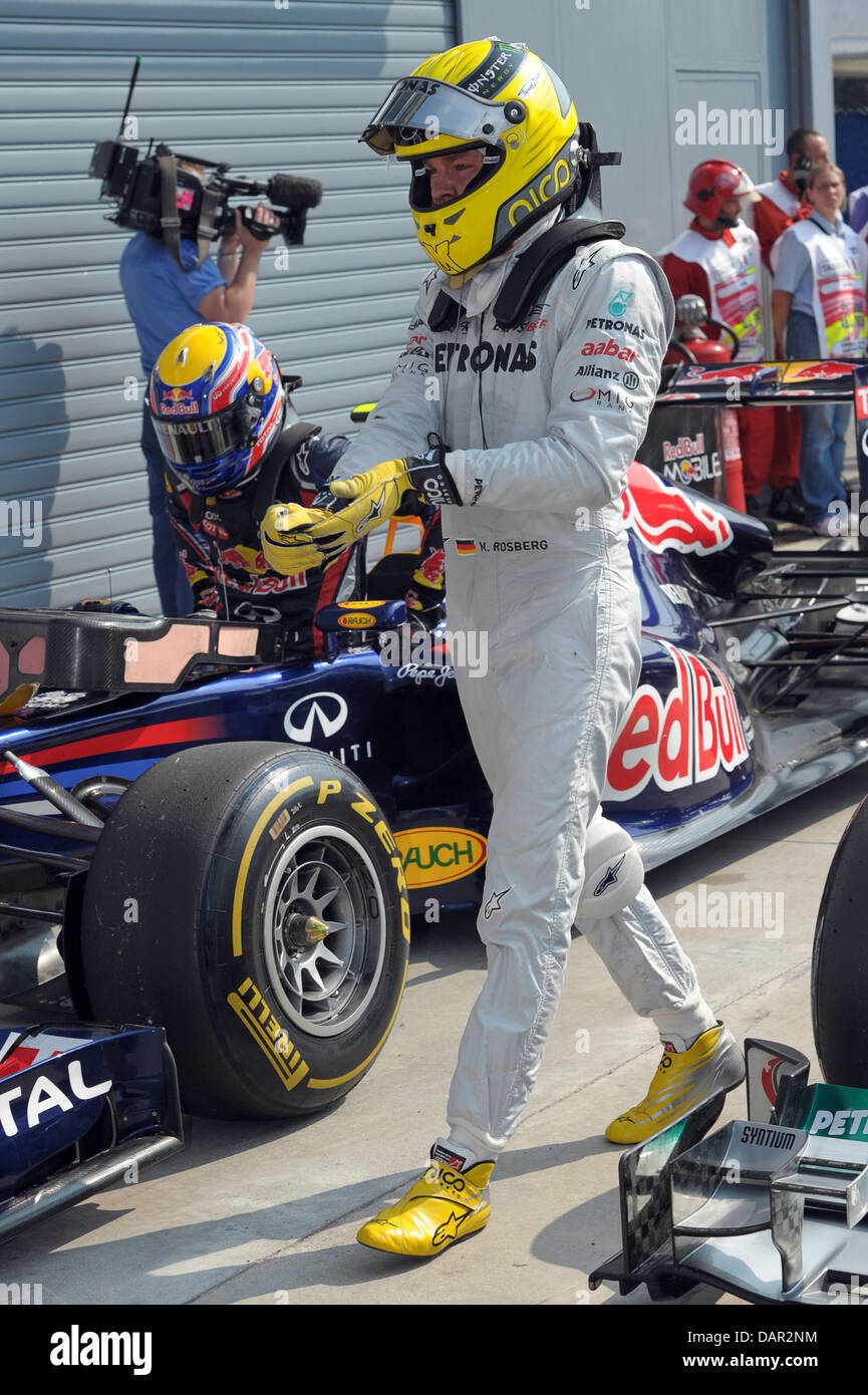 German Formula One driver Nico Rosberg of Mercedes GP walks through ...