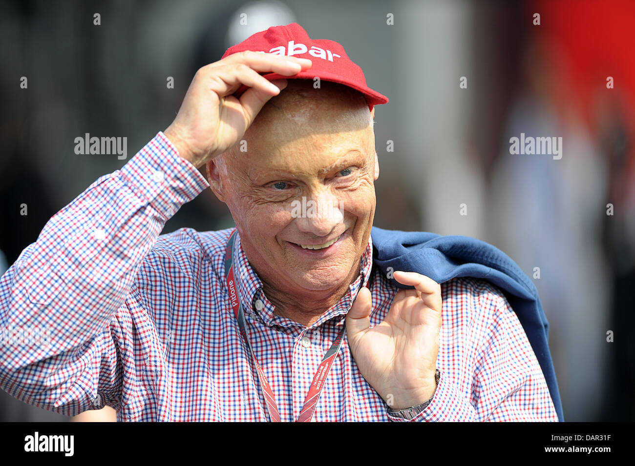 Former Austrian Formula One world champion Niki Lauda walks through the ...