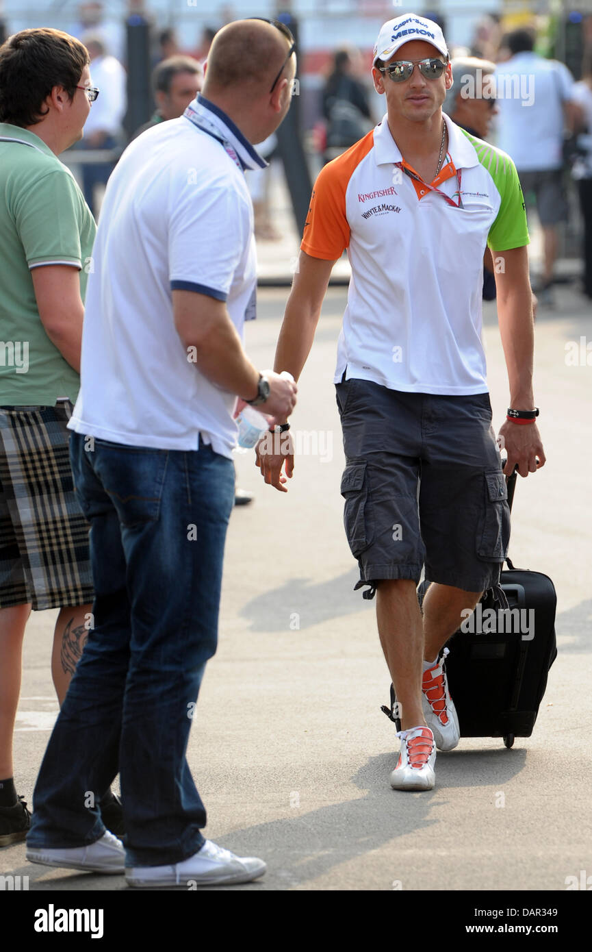 German Formula One driver Adrian Sutil of Force India arrives in the ...