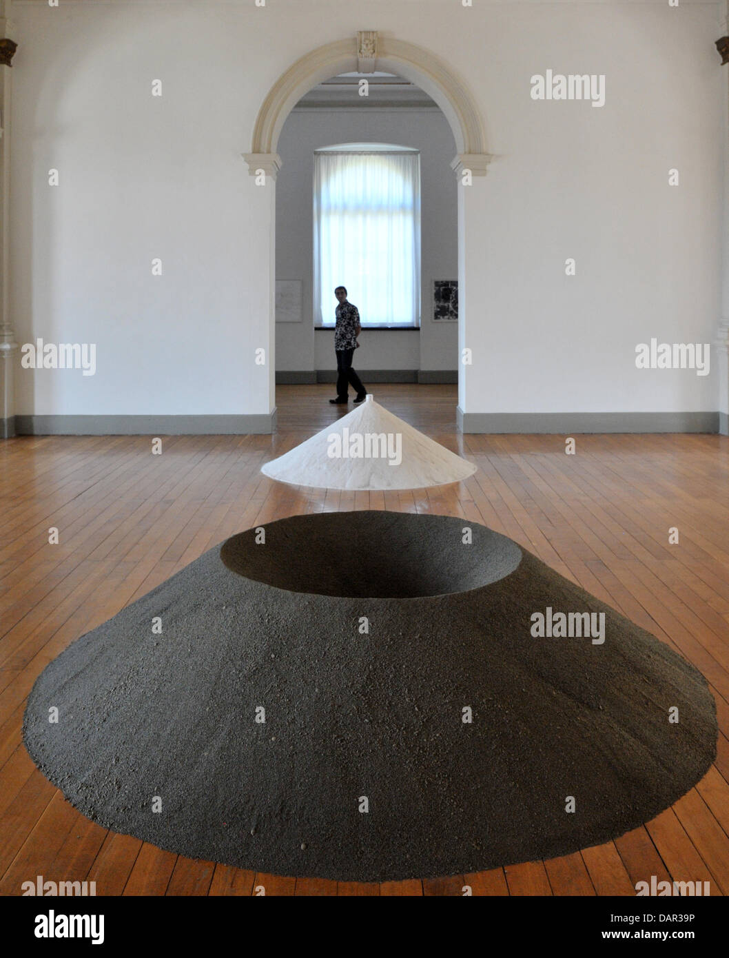 Visitors view the sculpture 'Colliery' by the Israeli artist Micha ...