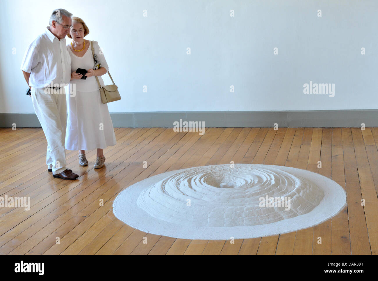 Visitors view the sculpture 'Colliery' by the Israeli artist Micha ...