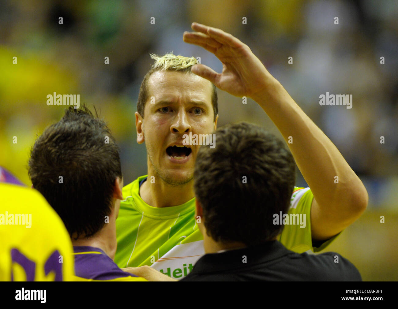 Hamburg's Pascal Hens is frustrated after the German handball ...
