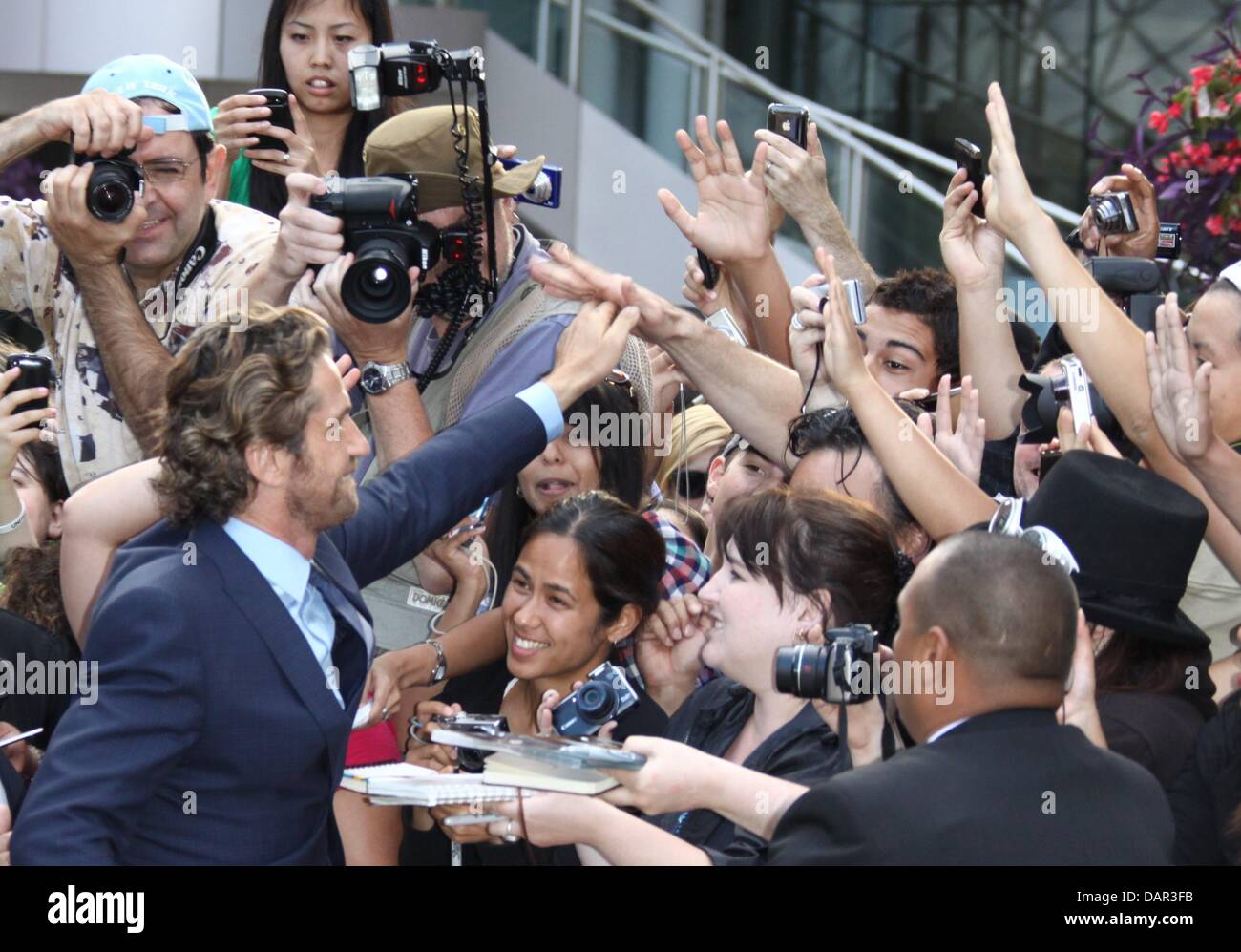 Scottish actor Gerard Butler attends the premiere of "Machine Gun ...
