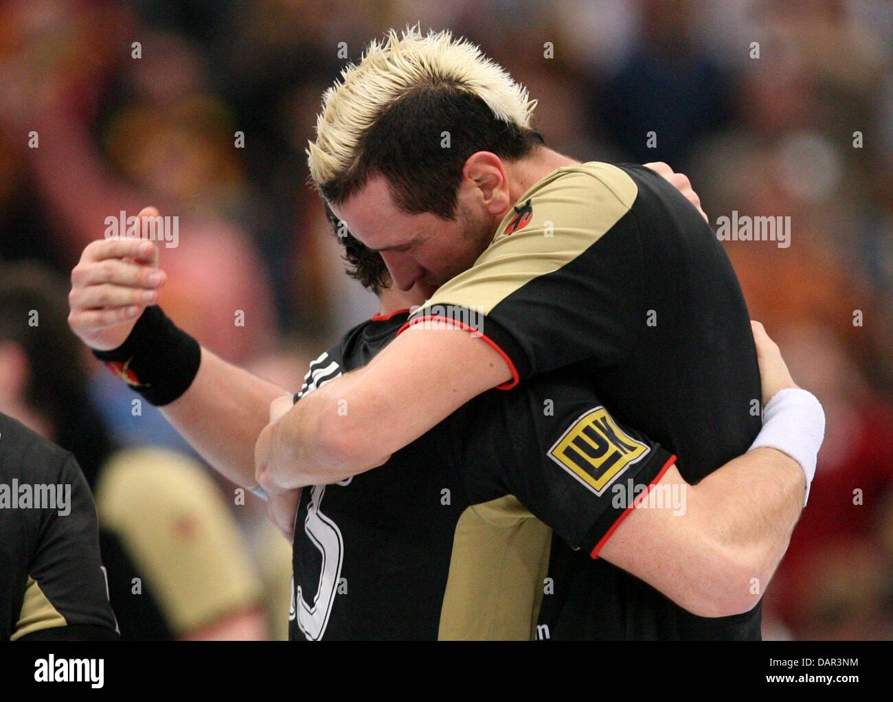 German player Pascal Hens (R) and Torsten Jansen cheer after Germany ...