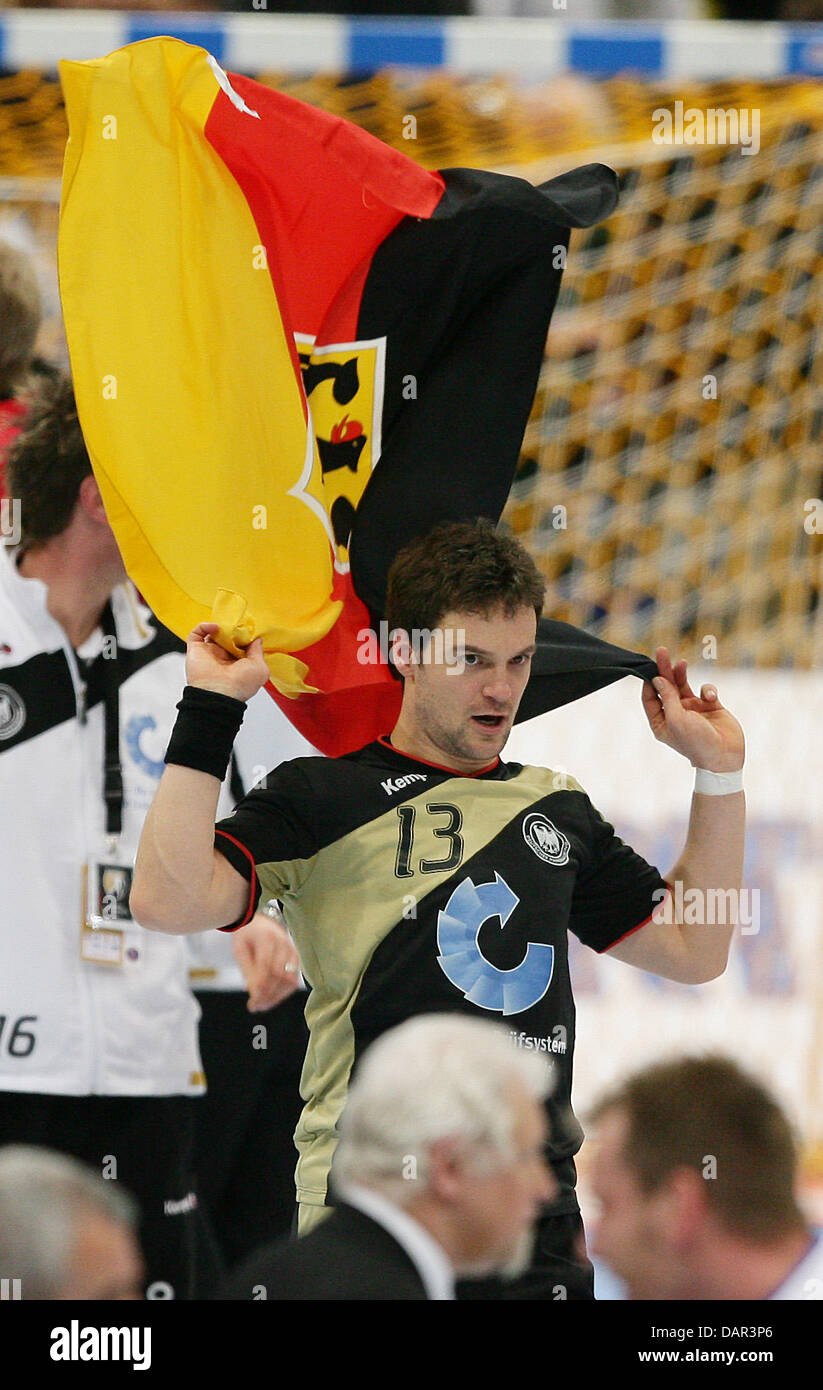 Germany's Markus Baur cheers after the German team wins the 2007 ...