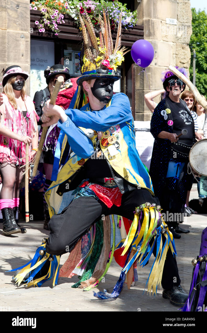 Portrait of a traditional male morris dancer with black face at the ...