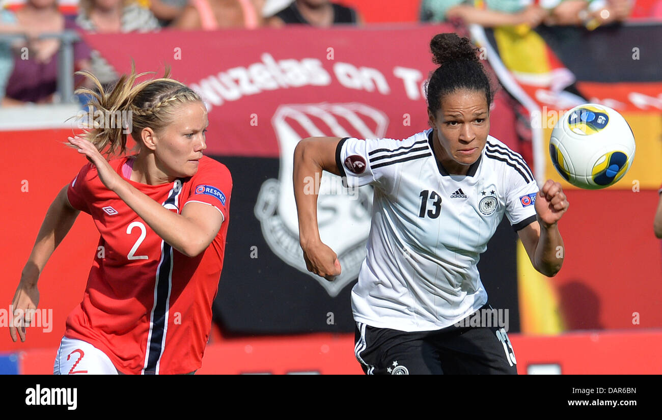 Celia Okoyino da Mbabi (r) of Germany fights for the ball with Marita ...