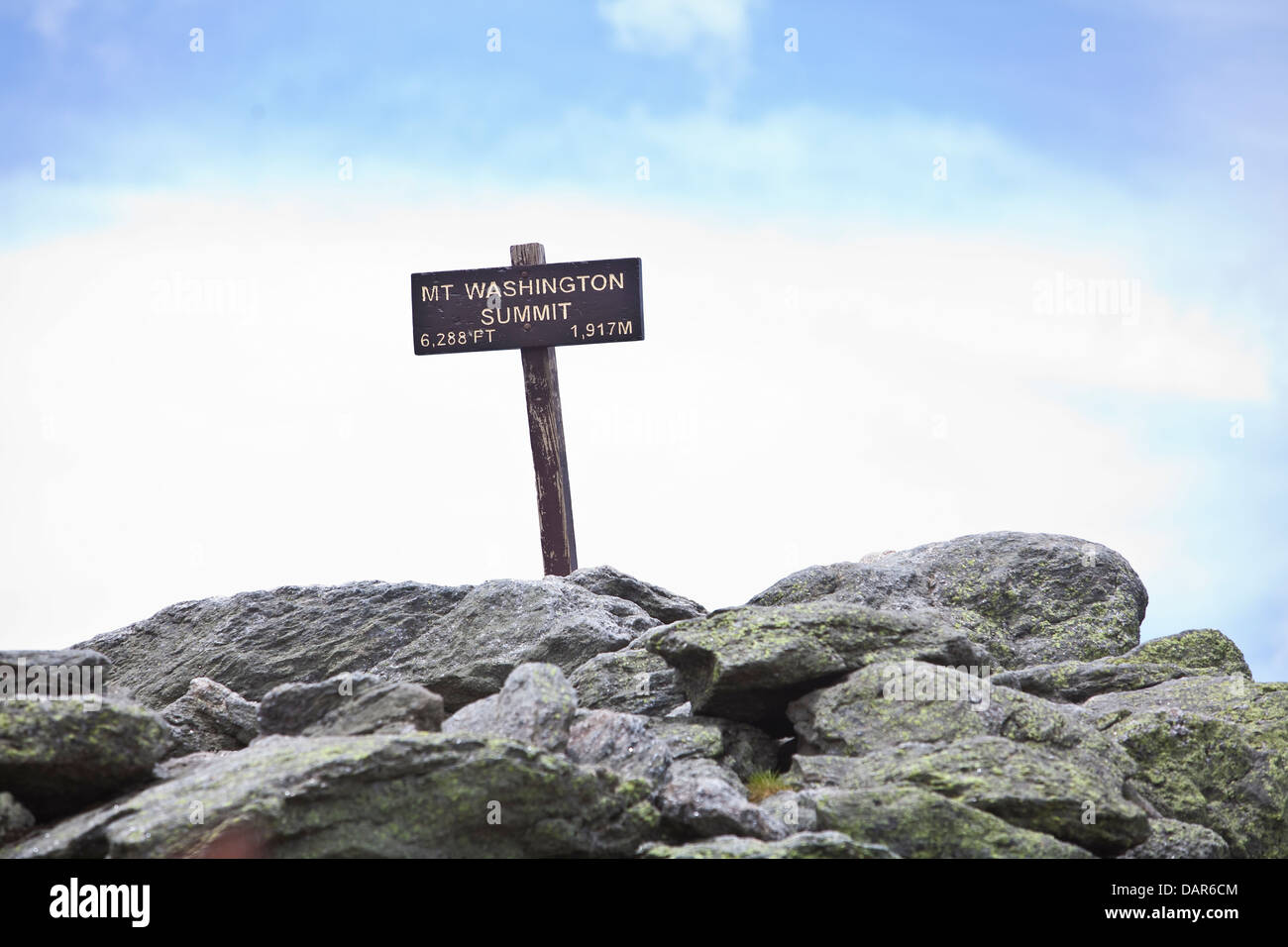 A sign showing the exact Mount Washington summit is pictured in New ...
