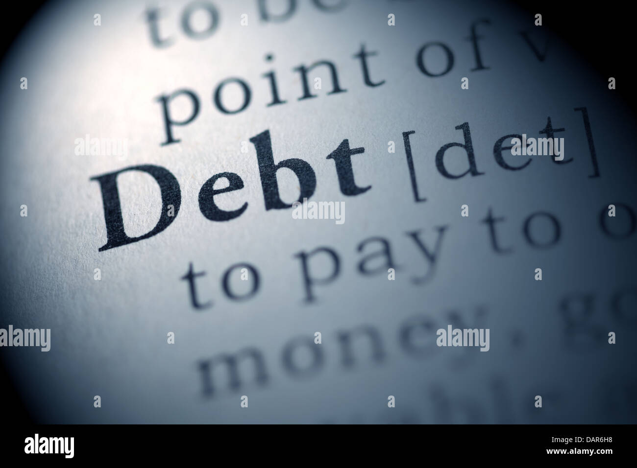 Fake Dictionary, Dictionary definition of the word Debt Stock Photo - Alamy