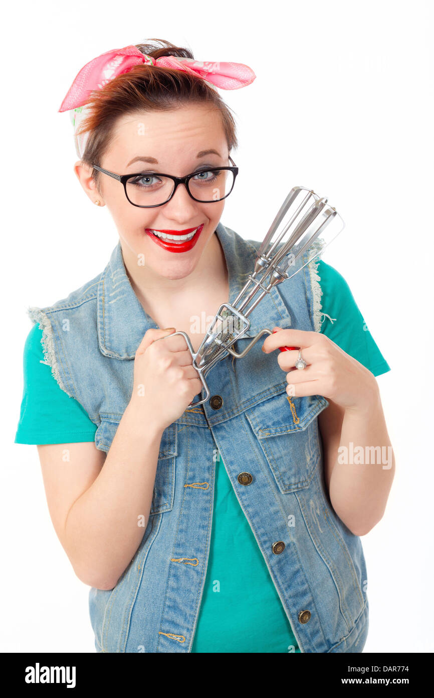 Teenage girl, dressed casually and wearing glasses, makes silly, funny ...