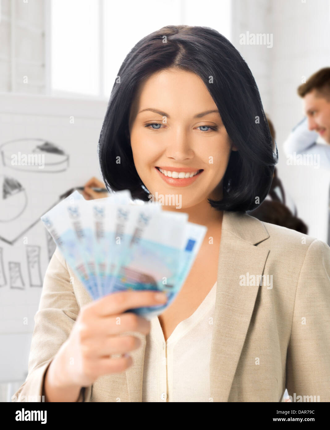 happy businesswoman with cash money in office Stock Photo - Alamy