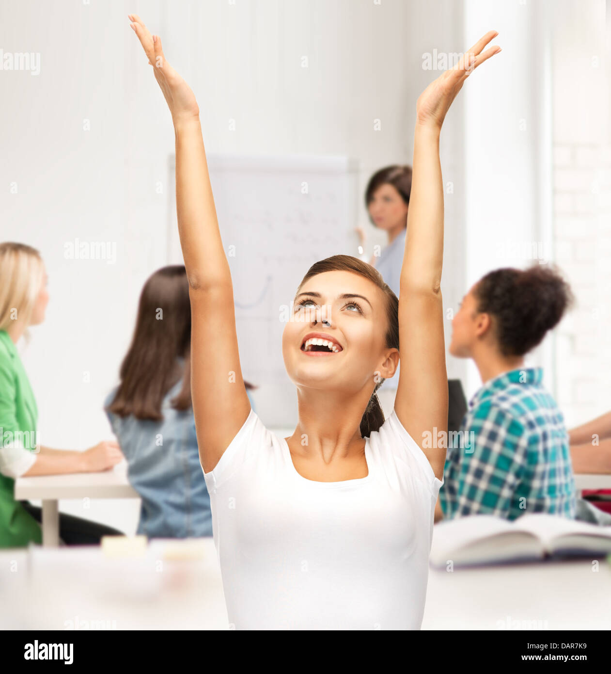 happy student girl with hands up Stock Photo - Alamy
