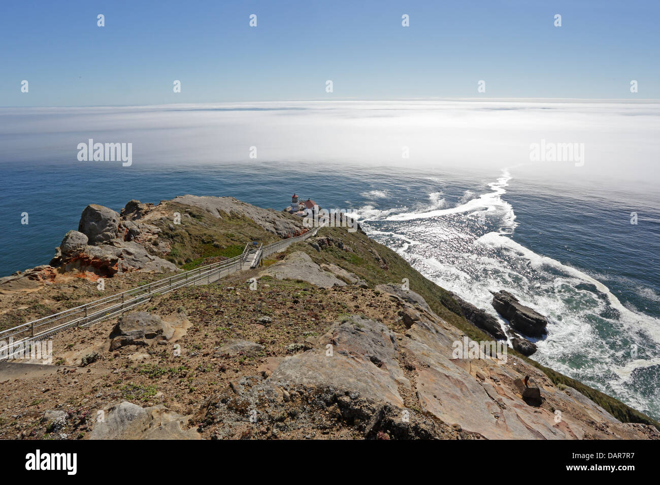 Point Reyes lighthouse with fog on the Pacific Ocean Stock Photo - Alamy