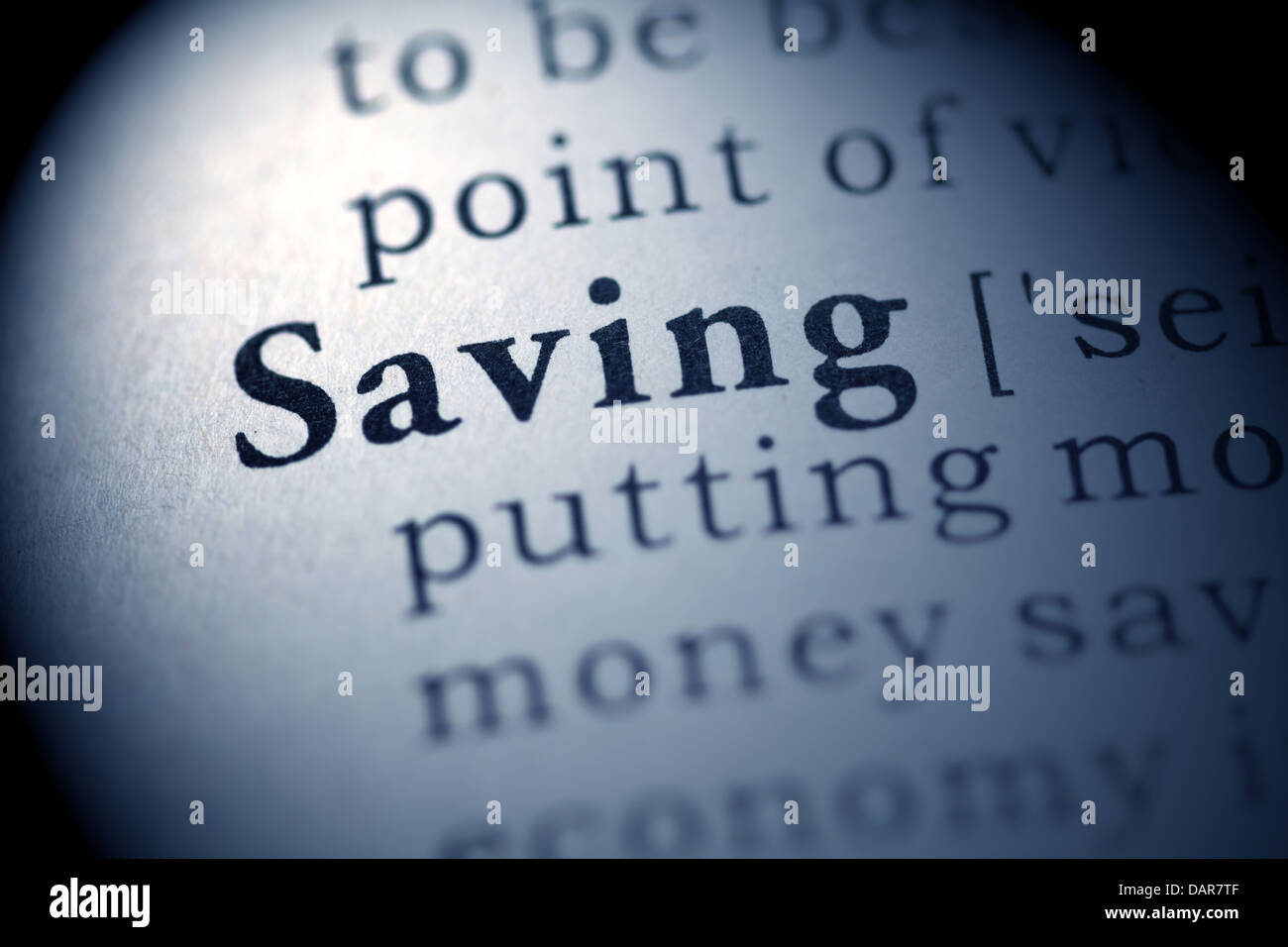 Fake Dictionary, Dictionary definition of the word Saving Stock Photo ...
