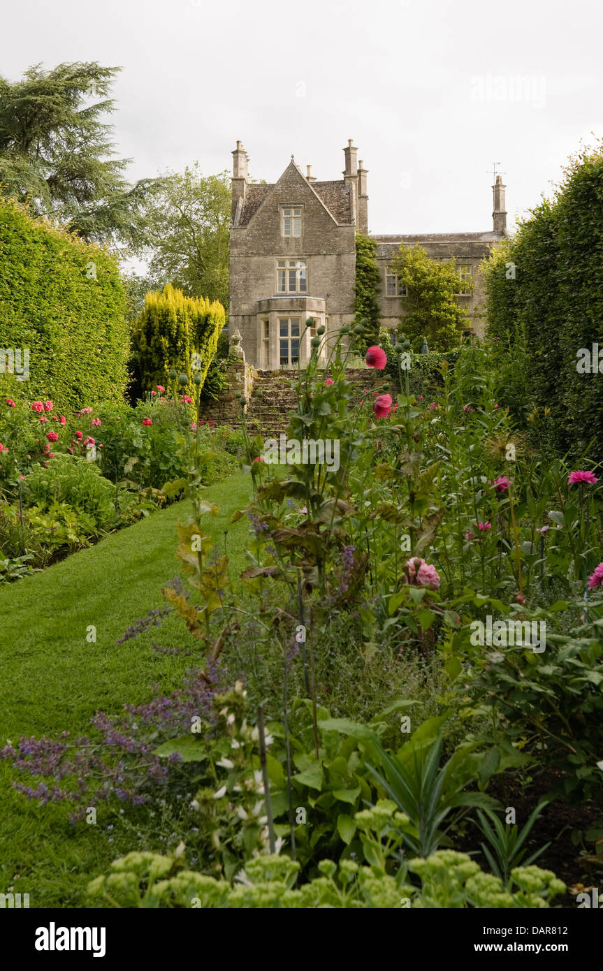 Exterior facade of Ampney Park, Jacobean manor house seen from garden ...