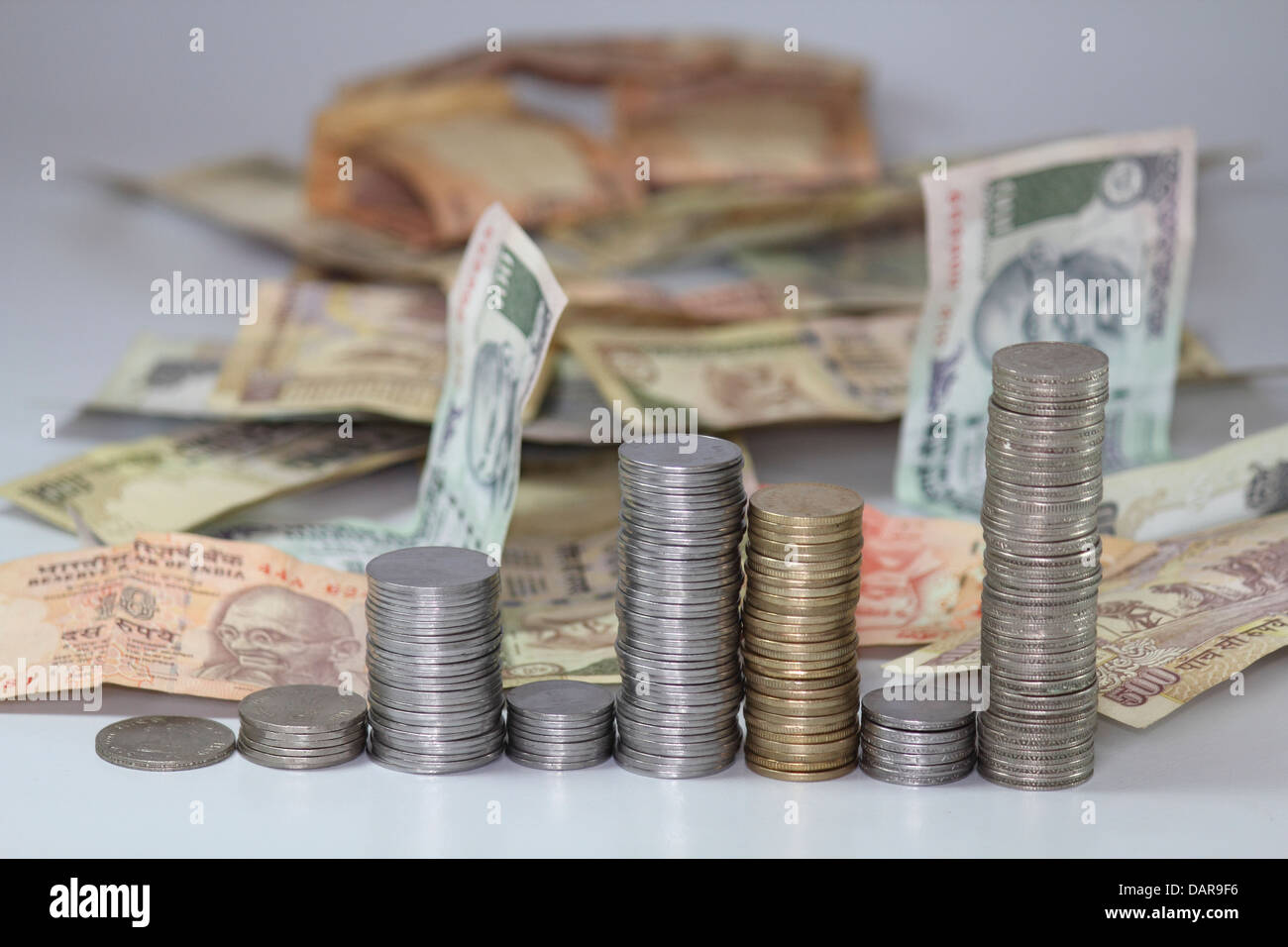 Indian Coins Stack in form of bar graph with Indian Rupees Stock Photo ...