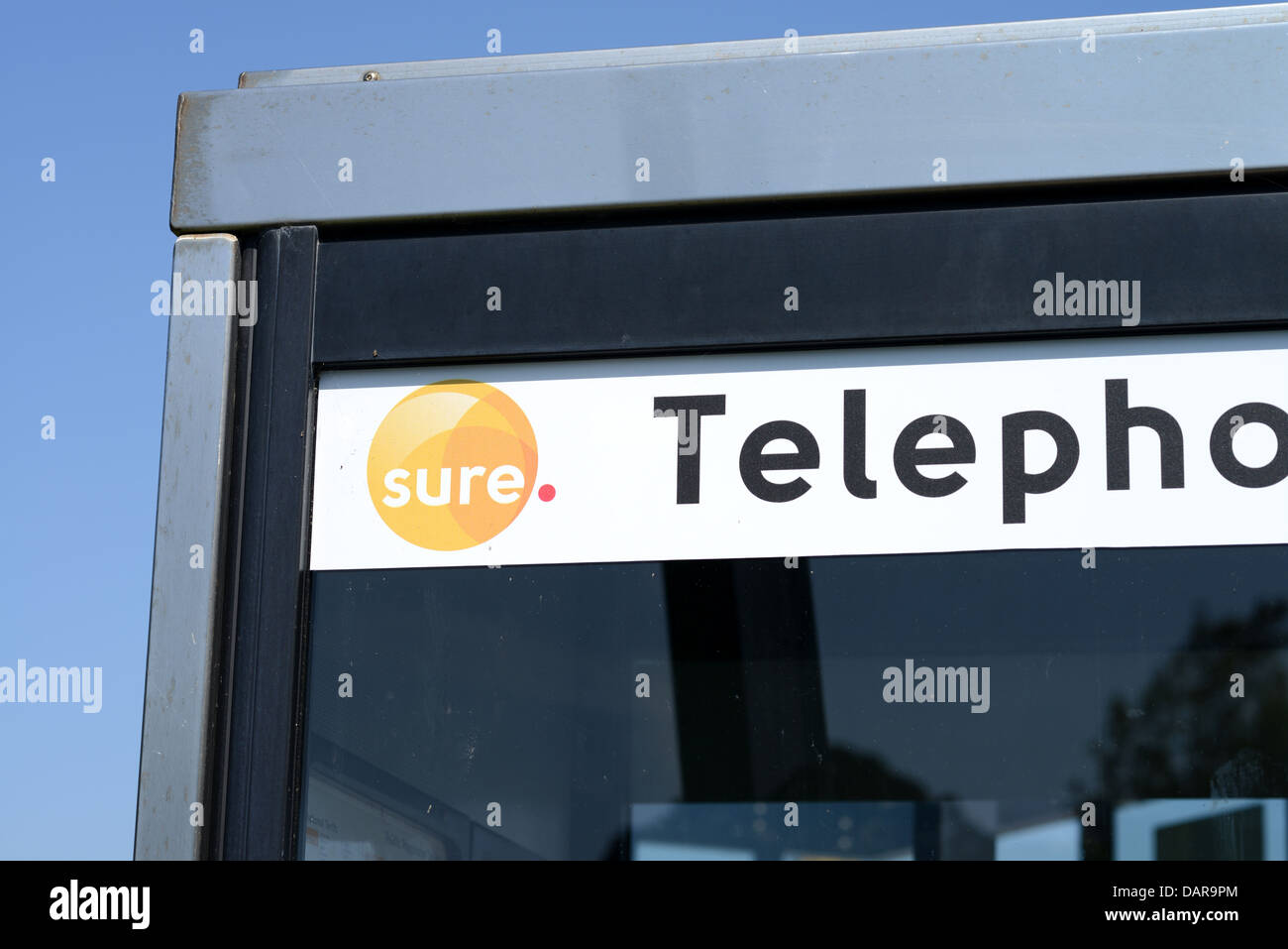 Sure telephone box Stock Photo - Alamy