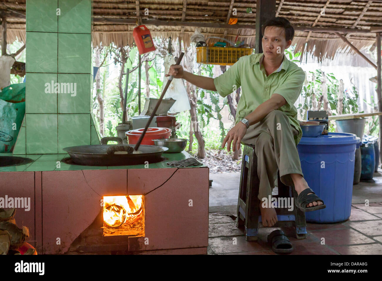 Man stoking fire hi-res stock photography and images - Alamy